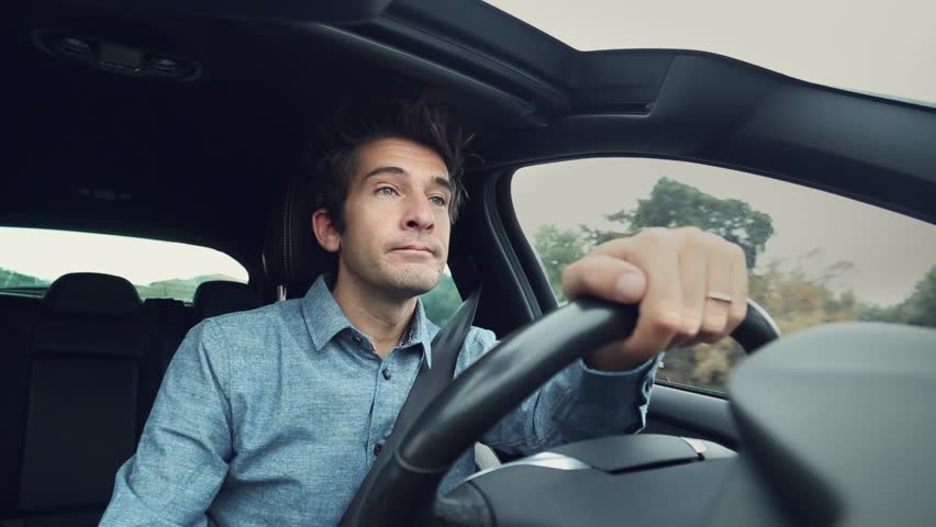 Happy Hip Business Man Dancing And Singing Celebrating While Driving