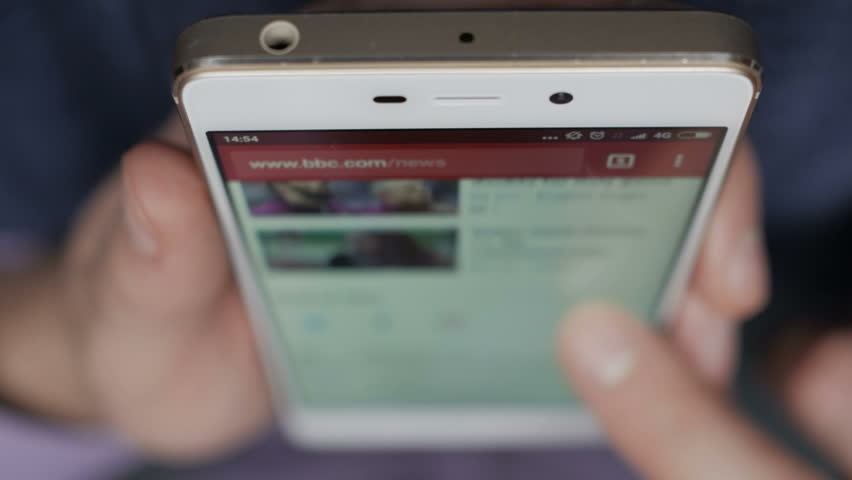 Stock video of man using his smartphone with to | 1007066353 | Shutterstock