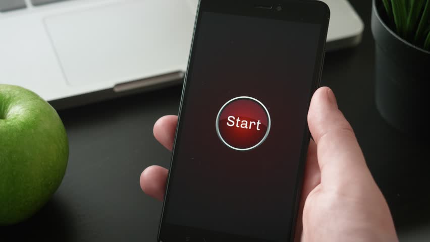 Pressing Start Button On the Video de stock (totalmente libre de ...