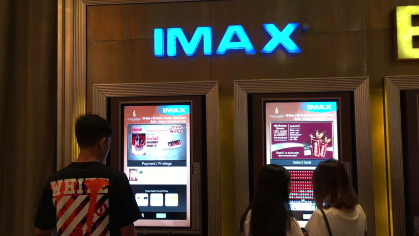 BANGKOK - DECEMBER, 2017: Young People Buy E Tickets At Krungsri IMAX ...