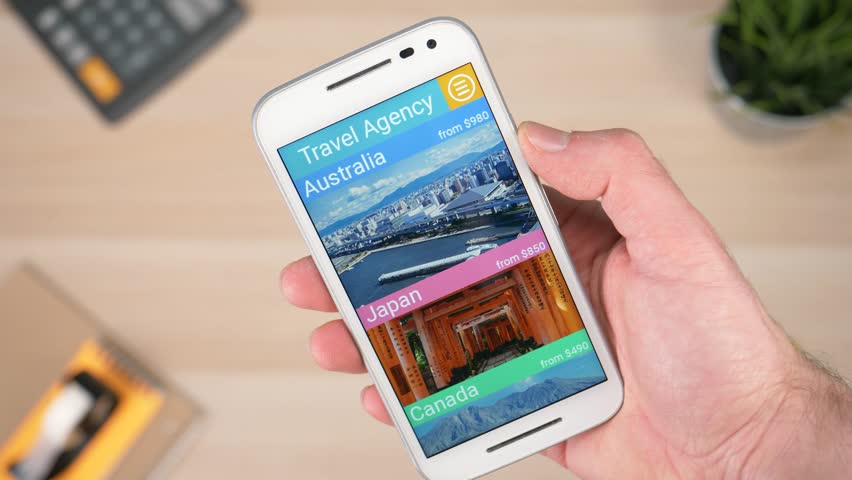 Using a Smartphone to Check Stock Footage Video (100% Royalty-free ...