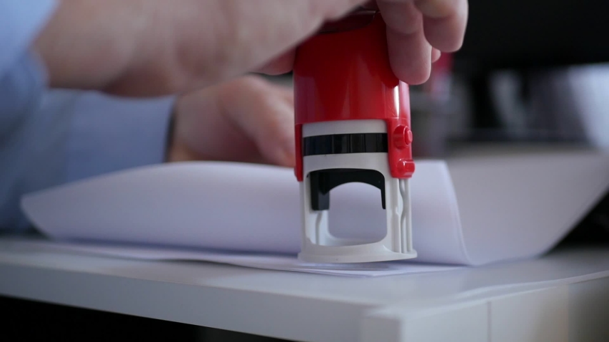 Manager Stamping Some Papers and Stock Footage Video (100% Royalty-free ...