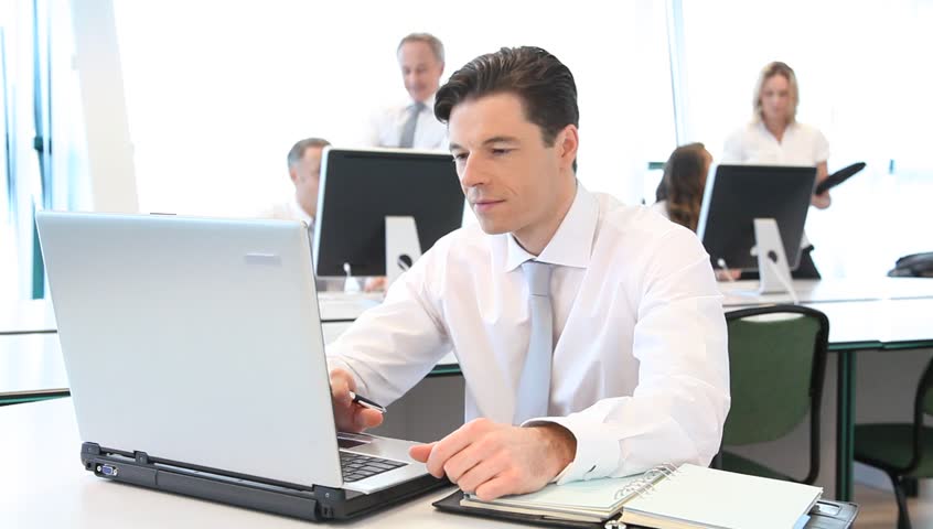 Salesman Working In Office With Laptop Computer Stock Footage Video ...
