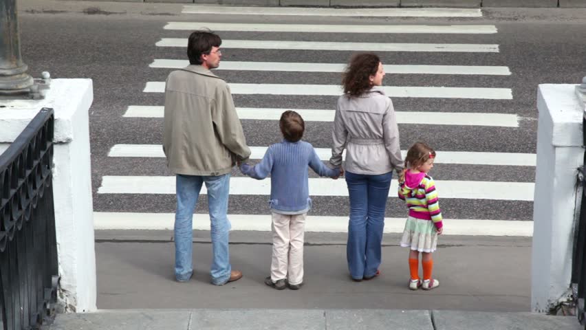 Family Goes By Pedestrian Crossing Road, Parents Keep Childrens Hands ...