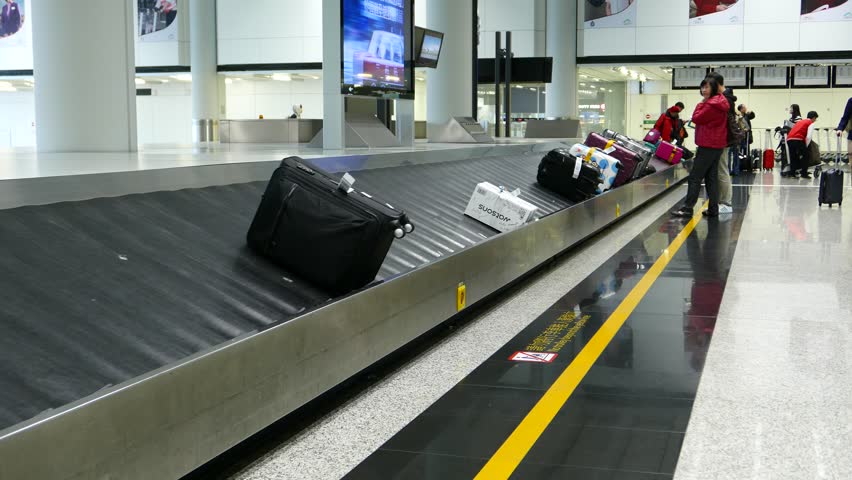 HONG KONG - FEBRUARY 18, 2015: Baggage Carousel At Arrival Airport Hall ...