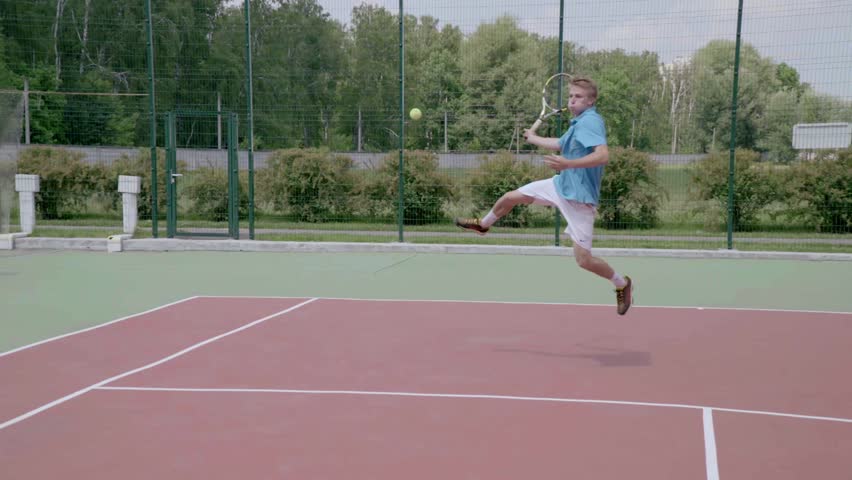 Slow Motion Of Young Women Playing Tennis. Zooming In And Out To The ...