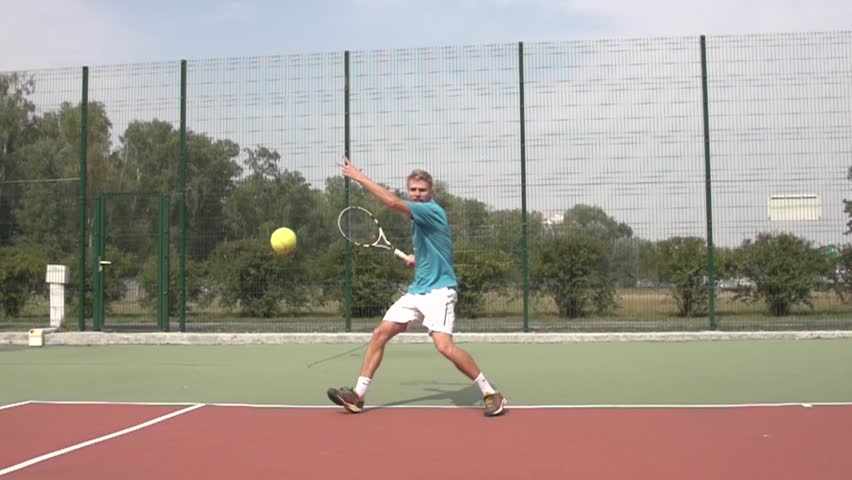 Slow Motion Of Young Women Playing Tennis. Zooming In And Out To The ...