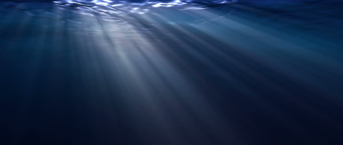 Underwater View Of Tropical Sea Looking Up At The Surface With Sun ...