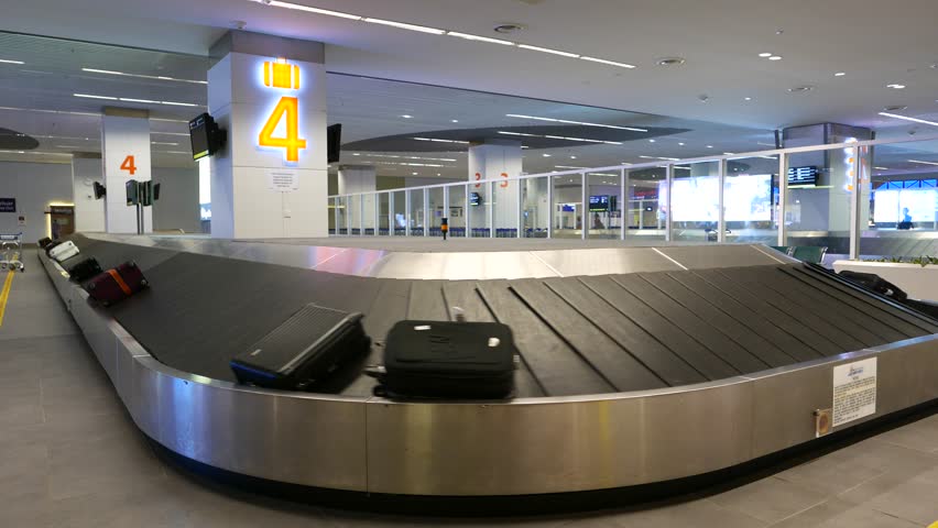 KUALA LUMPUR, MALAYSIA - FEBRUARY 24, 2015: Luggage Claim Hall ...