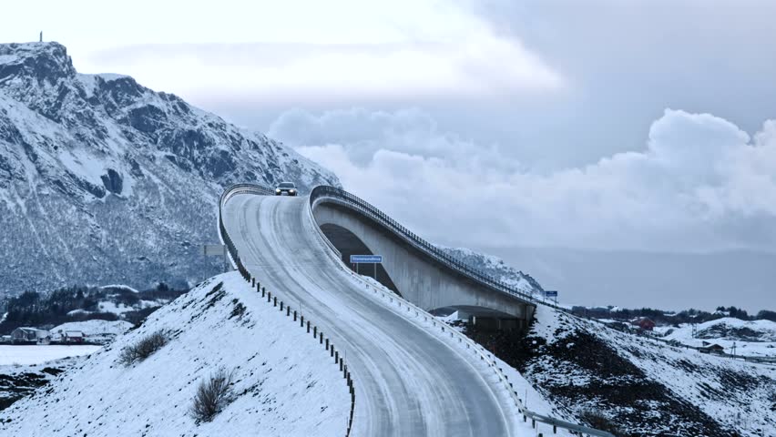 Closeup Of Cars Driving On Frozen Bridge In Norway Atlantic Road Stock ...
