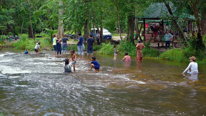 CIRCA 2010s - Belize - Women Wash Clothes In A River In A Third World ...