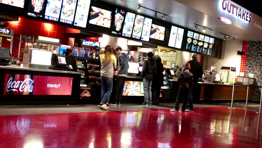 Coquitlam, BC, Canada - February 21, 2017 : People Buying Movie Ticket ...