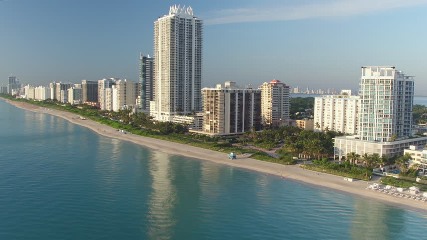 Stock Video Clip of AERIAL: Flying along exotic sandy Miami Beach ...