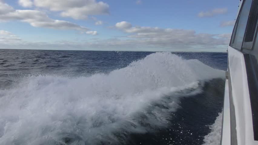 Power Boat Cutting Through The Waves - Slow Motion. Slow Motion Shot Of ...