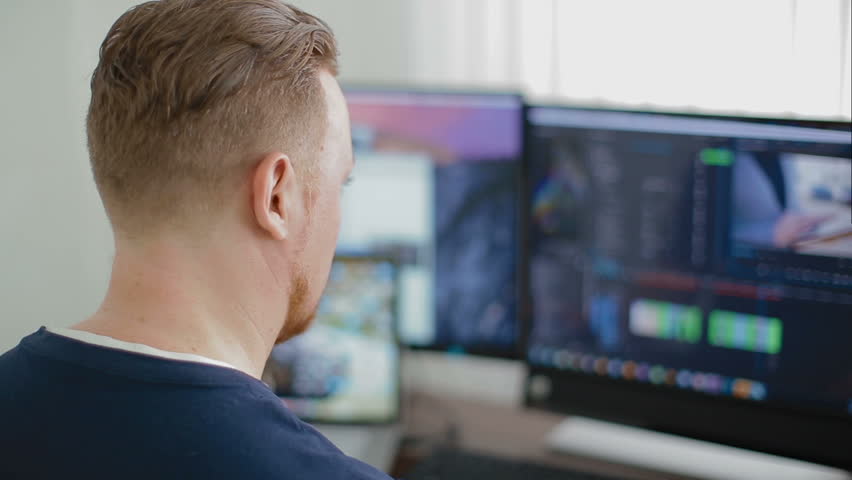 Close Up Of A Speccy Guy At The Screen Of Computer Stock Footage Video ...