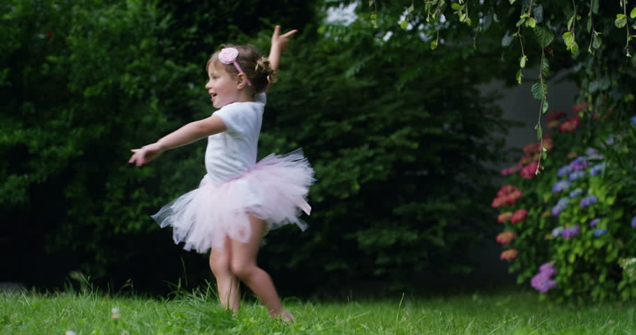 On A Sunny Spring Day A Little Girl Dressed Like A Ballet Dancer ...