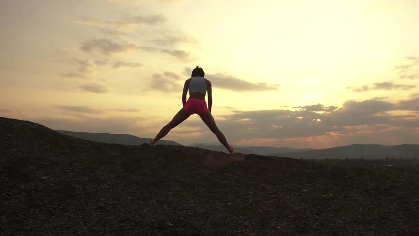 Young Woman Standing Yoga Pose On Top Of Mountain. Reaching The Top ...