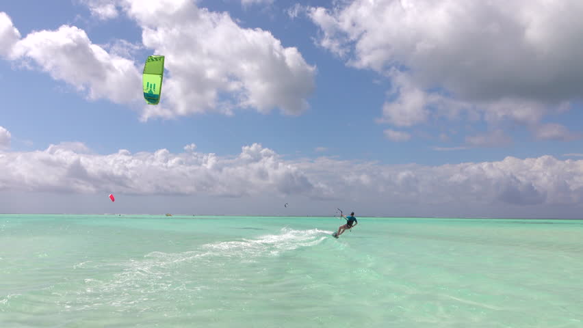 SLOW MOTION: Young Kiter Girl Kitesurfing In Turquoise Ocean With ...