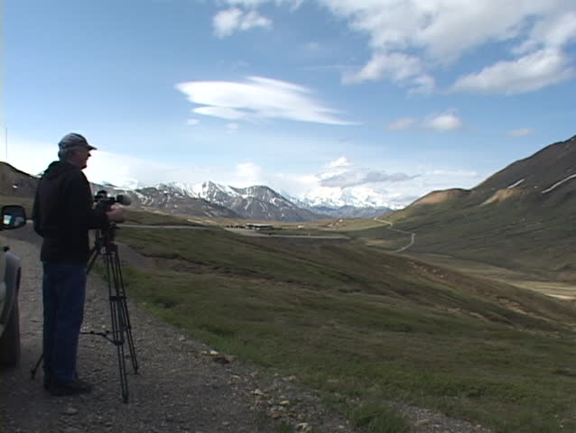 Wide Angle Point Of View Shot Of Bicycling Through A Movie Set Location ...