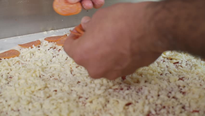 Slow Motion Close-up Of Drooping Slice Of Pepperoni Pizza Cooked In ...