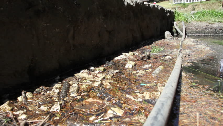 Water Pollution With Garbage, Plastic And Human Waste Waterfall In ...