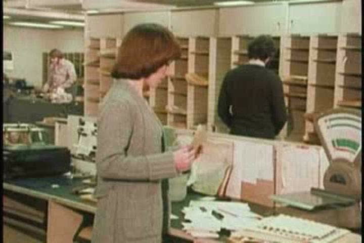 An Employee in the Mailroom Stock Footage Video (100% Royalty-free ...