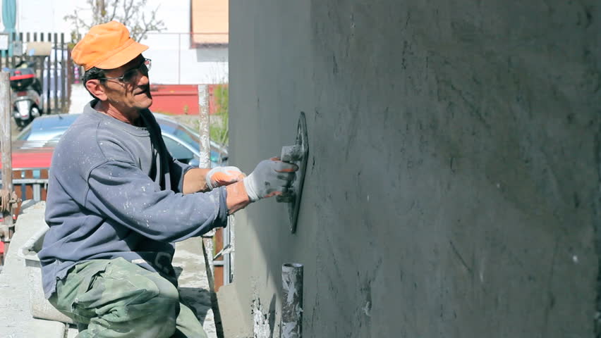 Mason Worker Plastering Wall. Mature Contractor Plasterer Working ...