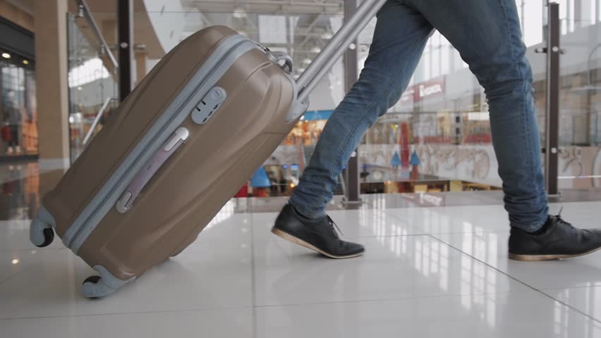 Young Man Pulling Suitcase in Stock Footage Video (100% Royalty-free ...