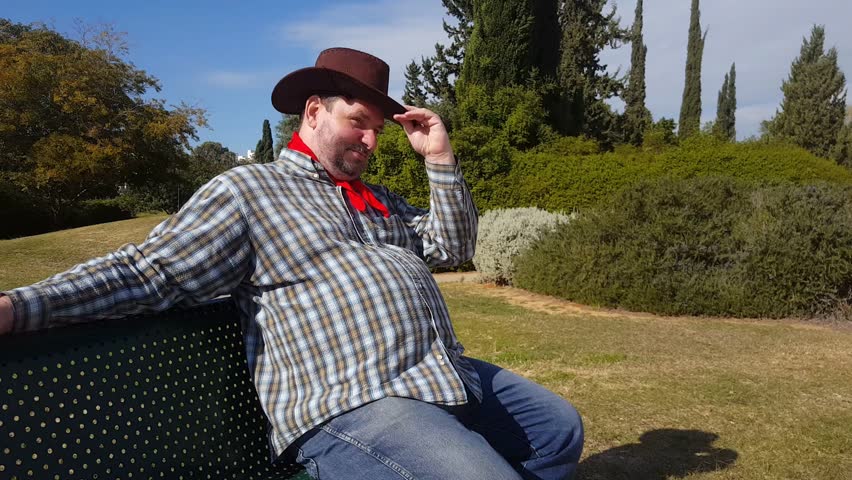 Fat Mature Cowboy Makes Faces While Takes Selfie With Mobile Phone ...