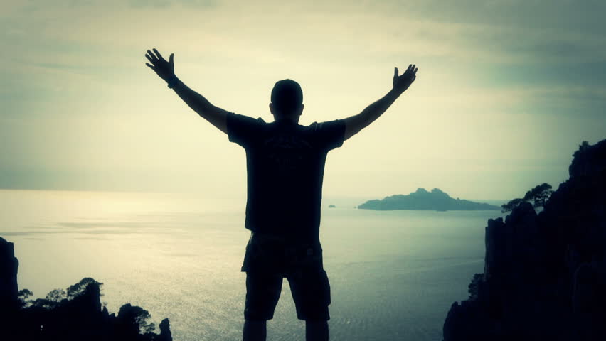 Model Released Man On Viewpoint Raises His Arms In The Air On A ...