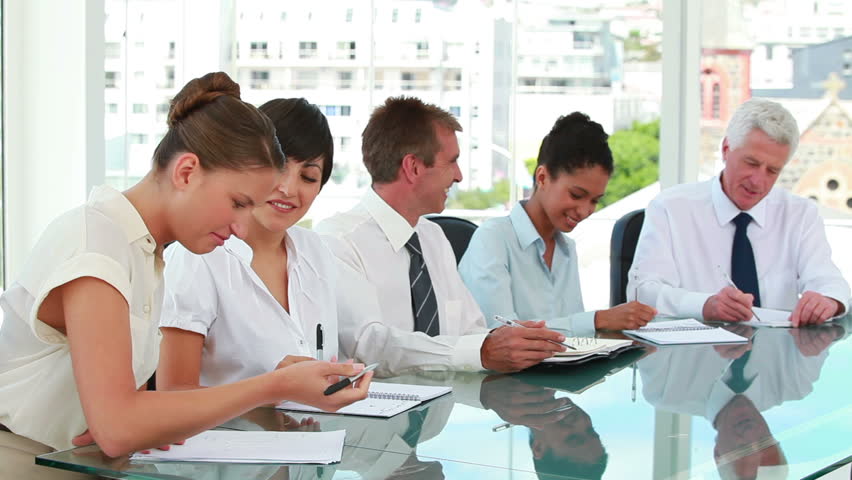 Group Of Business People Using Laptop And Tablet Computer During A ...
