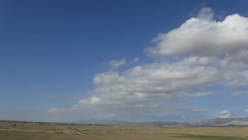 Rain Clouds Flying On Blue Sky Over Field. White And Gray Clouds Flying ...