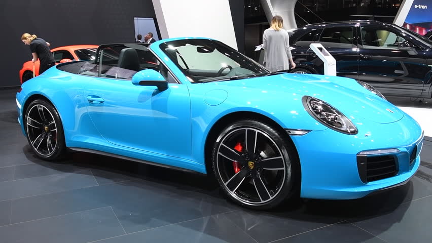 AMSTERDAM, THE NETHERLANDS - APRIL 16, 2015: Light Blue Porsche 911 ...