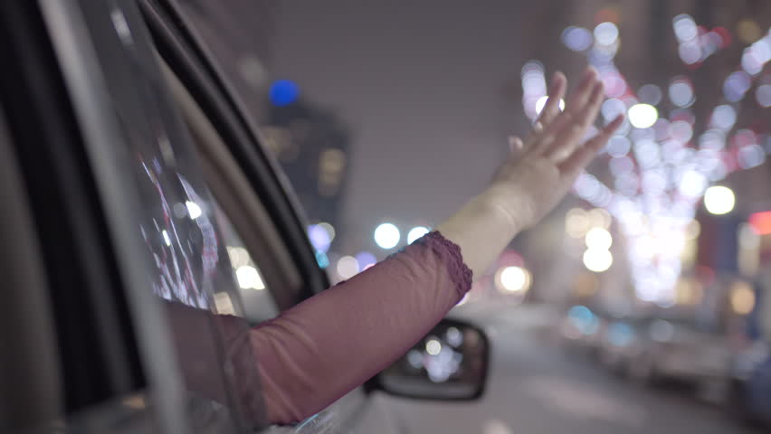 Young Woman Puts Her Hand Out Moving Car Window, Feels The Breeze At ...