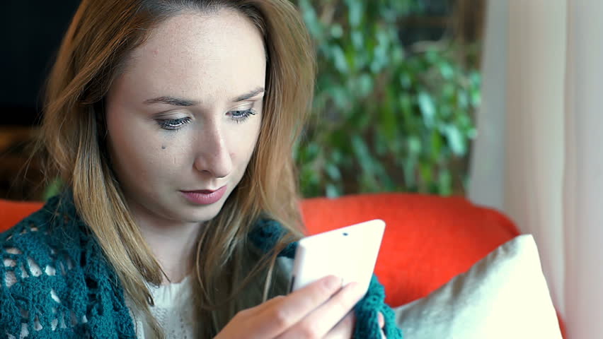 Stock Video Clip of Sad girl crying while browsing internet on ...