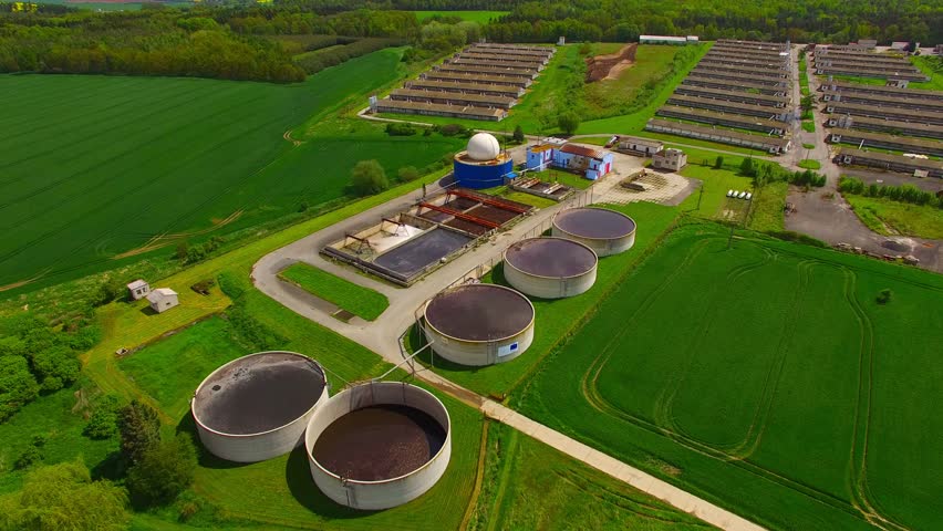 Camera Flight Over Biogas Plant From Pig Farm In Green Fields ...