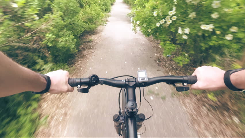 Speed Riding Downhill A MTB Bike On Mountain Dirt Road. View From First ...