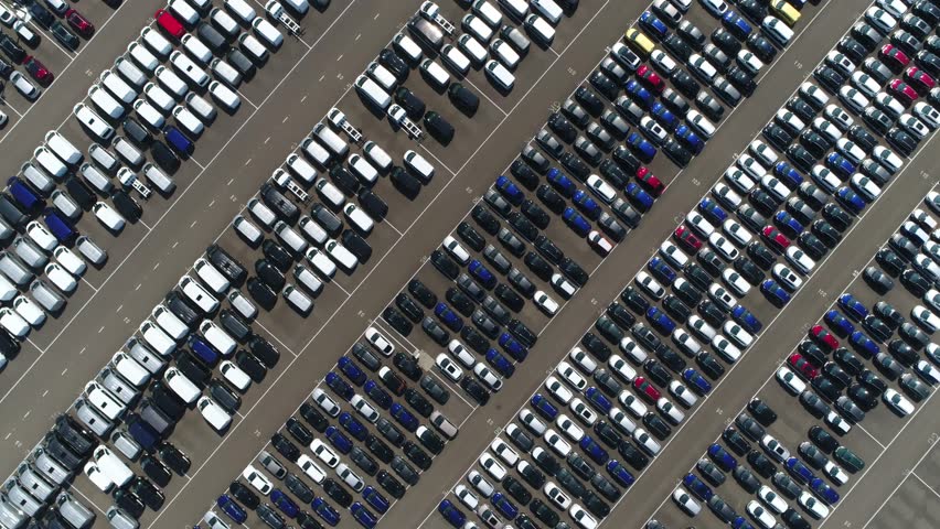 Aerial Top Down View Flying Sideways Over New Car Storage Parking Lot ...