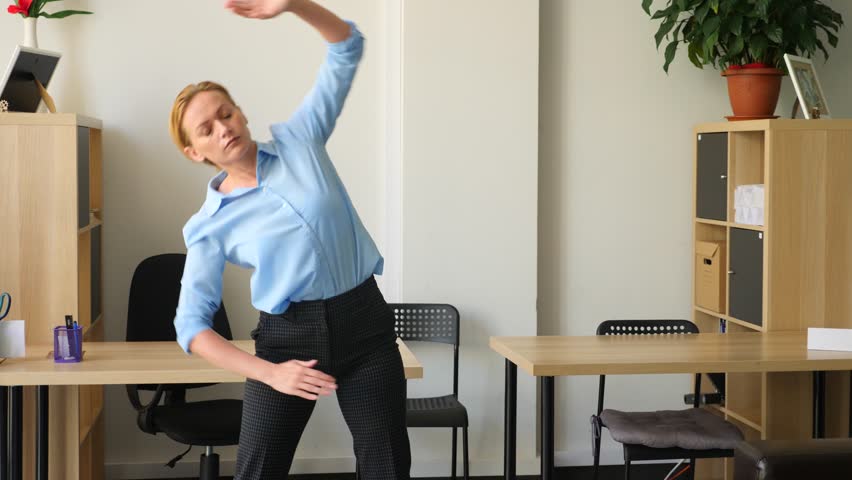 Male Executive Performing Yoga At Her Workplace In Office. 4k, Slow ...