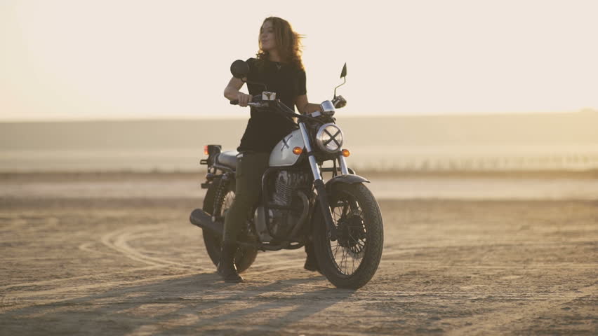 Stock video of attractive young woman motorcyclist makes a | 31010953 ...