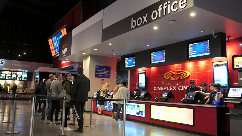Coquitlam, BC, Canada - December 04, 2015 : People Buying Movie Ticket ...
