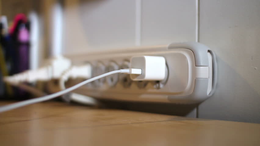 Unplugging Cord From Outlet To Save Electrical Energy Stock Footage ...