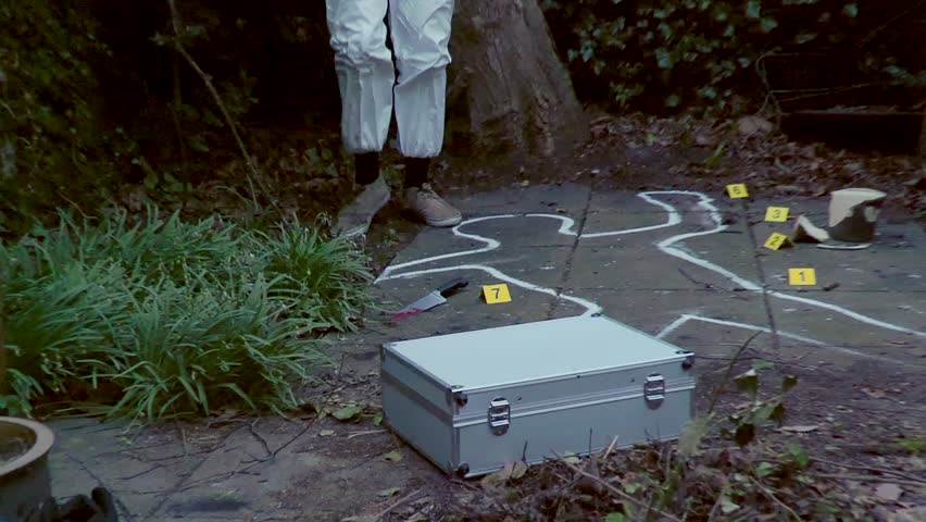 Pan Over A Crime Scene With A Blood Stained Knife And An Empty Rifle ...