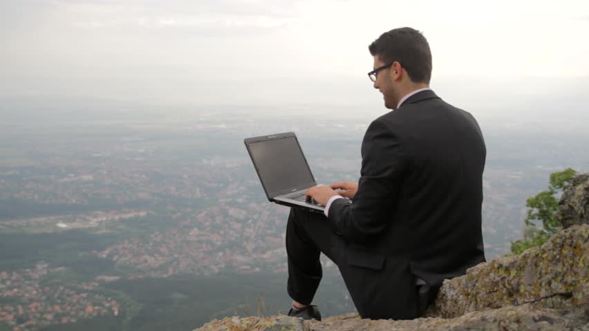 Stock video of joyful successful businessman working nature remote ...