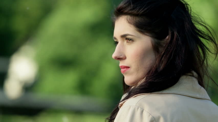 Stock video of woman in windy spring weather being | 4437863 | Shutterstock