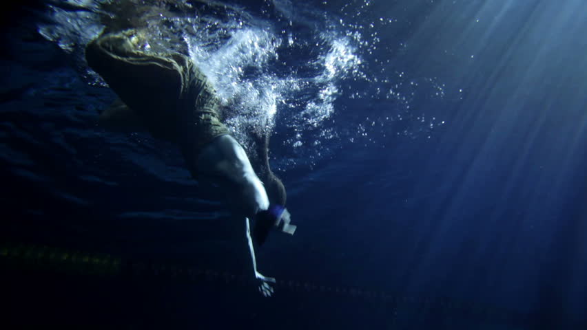 Two Young Women Swimming Underwater Together At Sea Stockvideos