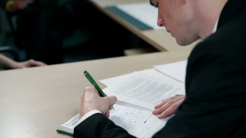 Businessman Writing Down Information Stock Footage Video (100% Royalty ...