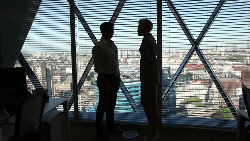 Businessmen In A Skyscraper Overlooking A City At Night Stock Footage ...