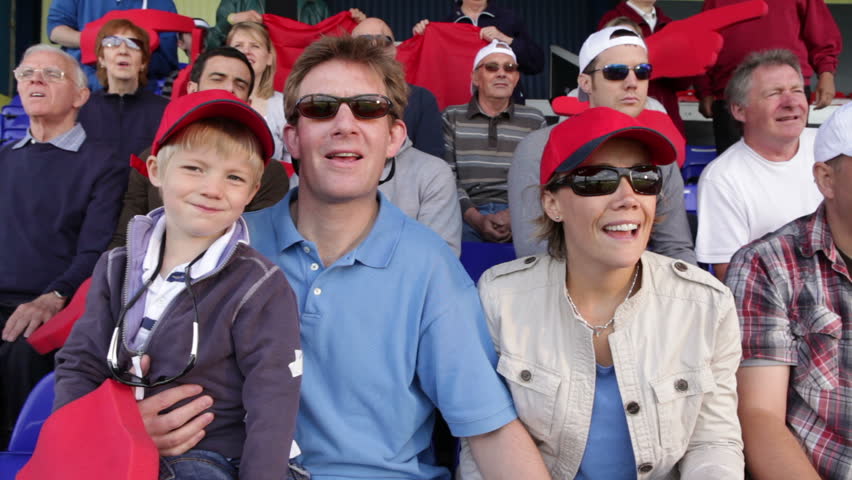 Enthusiastic Crowd Of Spectators Watching A Sports Game Or Football ...
