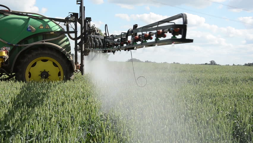 Tractor Spray Fertilize Field with Stock Footage Video (100% Royalty ...